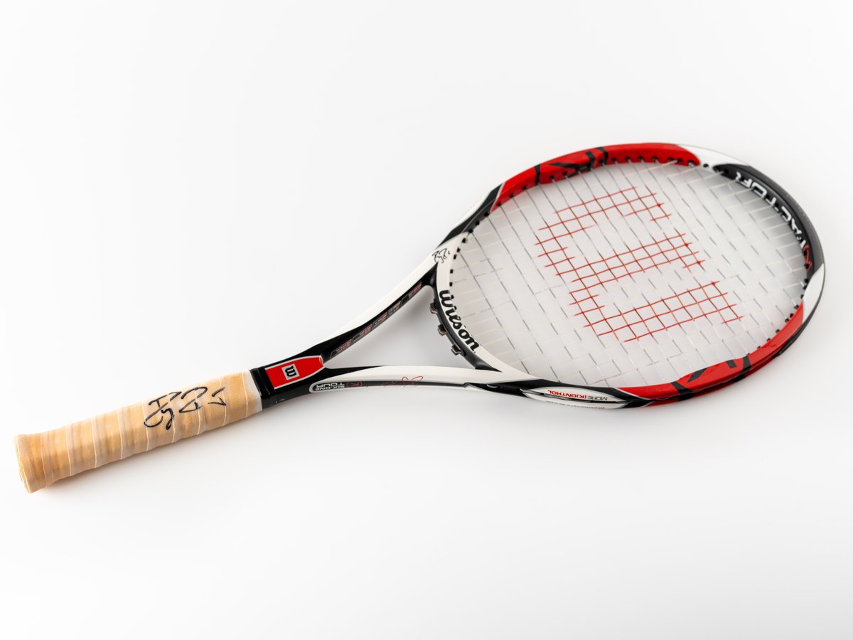 Racquet Signed by Roger Federer - Qatar Museums
